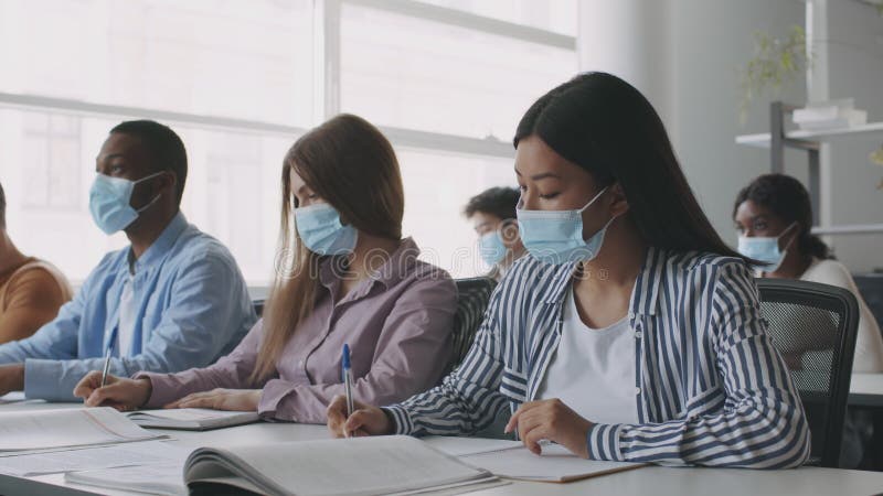 Covid 19 Protection during Study Process. Group of Diverse Student ...