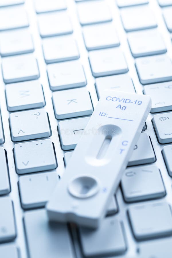 Covid-19 Rapid Antigen Test. Rapid Antibodies Test Kit and Computer ...