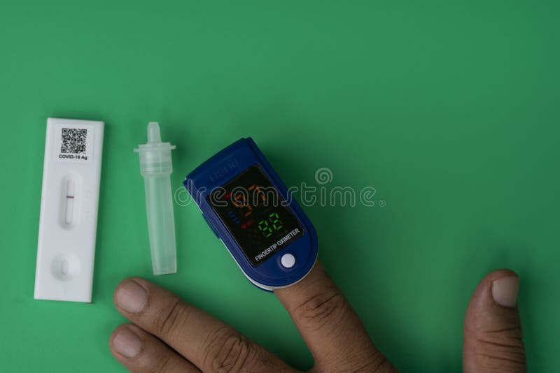 Covid 19 Rapid Antigen Test Kit and Oxymeter Stock Photo - Image of ...