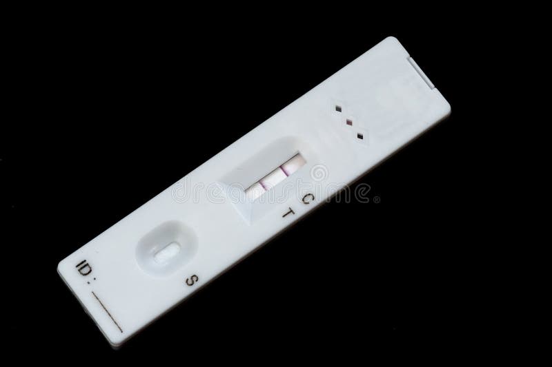 A Covid-19 Rapid Lateral Flow Test Showing a Positive Result Stock ...