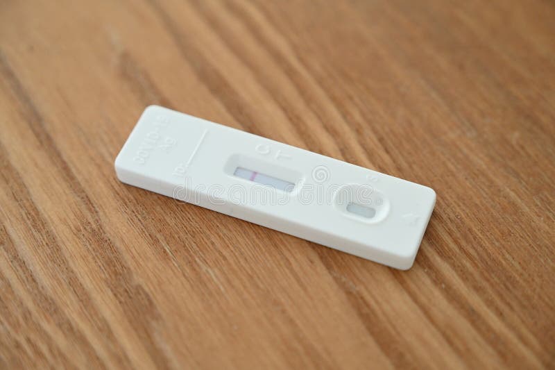 Covid Test Kit on Wooden Table Background Stock Photo - Image of ...