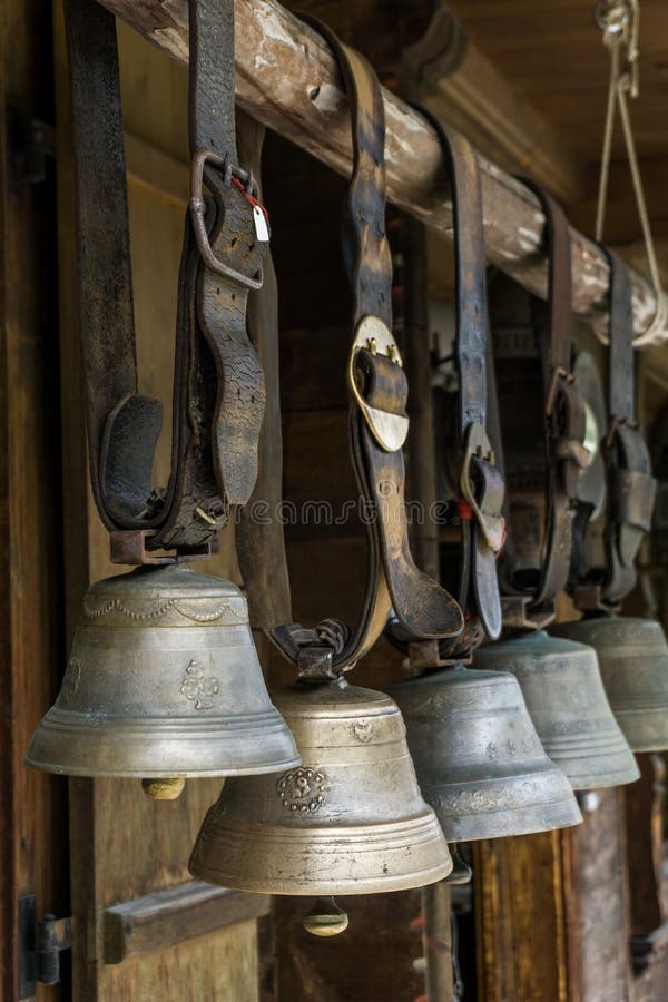 Cow bells in Switzerland stock photo. Image of village - 144032638