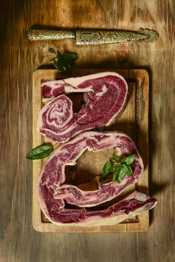 Cow Ribs Presented on the Table, Stock Photo - Image of juicy, wooden ...
