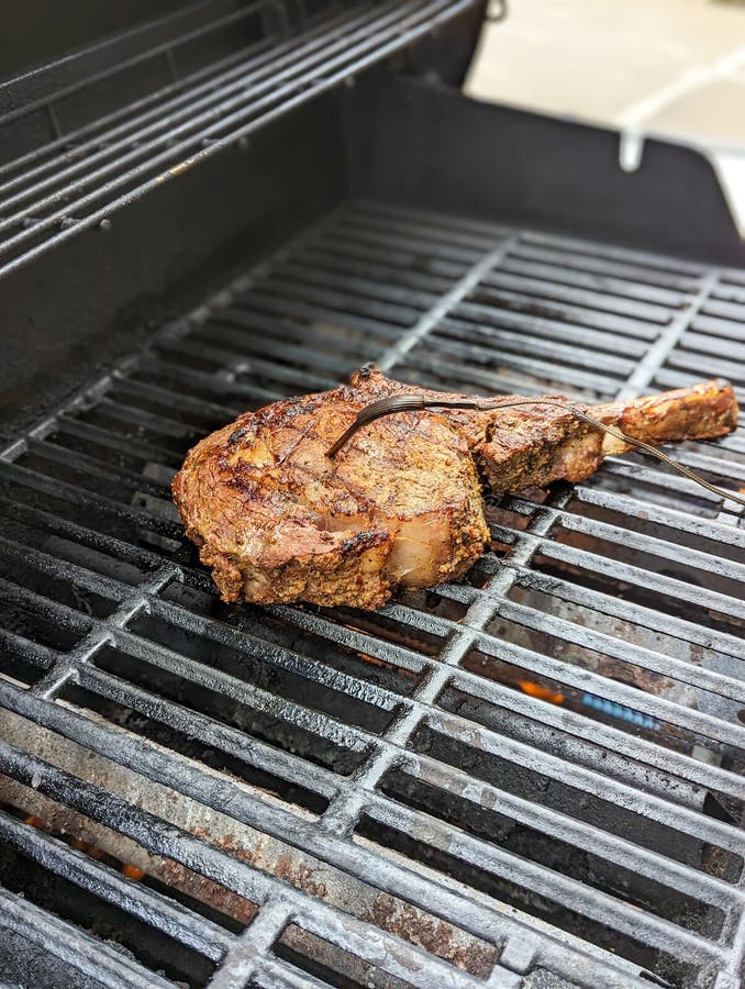 Cowboy Beef Tomahawk Premium Steak on a Grill Stock Image - Image of ...
