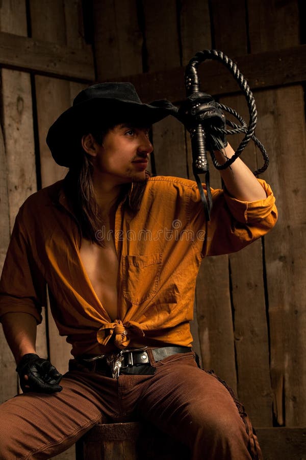 Cowboy with Black Leather Flogging Whip Stock Image - Image of american ...