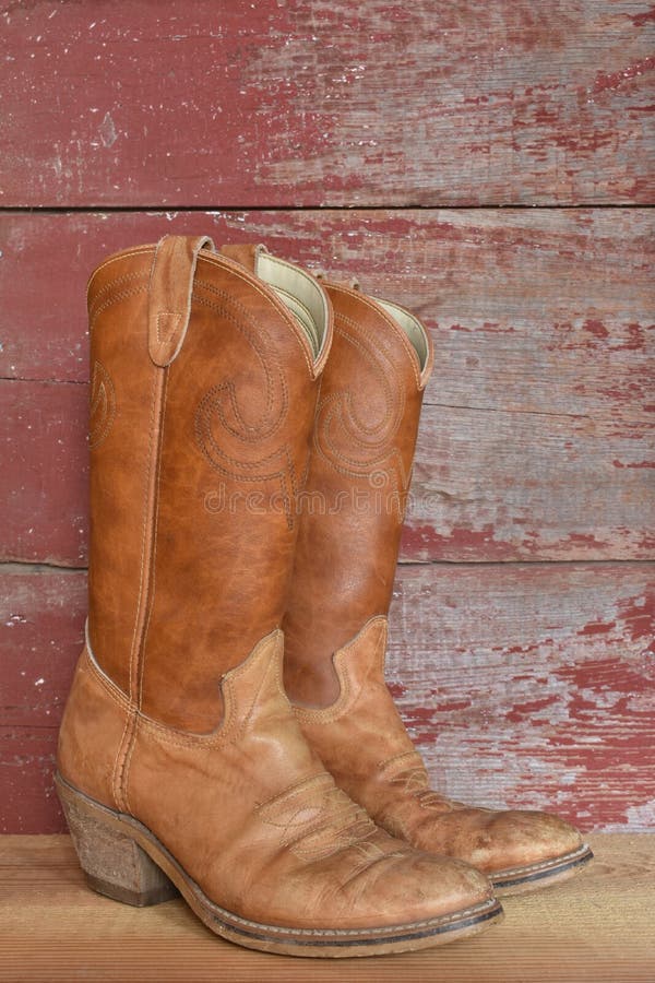 Red Cowboy Boots on Red Barn Board Stock Photo - Image of boots, wear ...