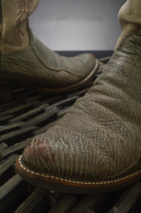 Cowboy Boots on Welcome Mat Stock Photo - Image of welcome, grey: 246937510