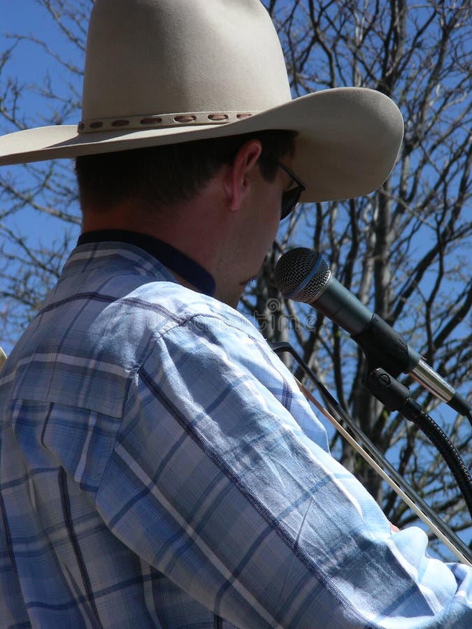 Cowboy Fiddler stock photo. Image of musician, gallon, fiddle - 744062