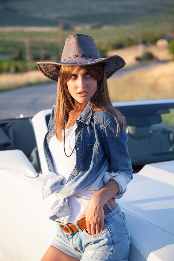 Cowboy Girl Stands at the Convertible Stock Image - Image of beautiful ...