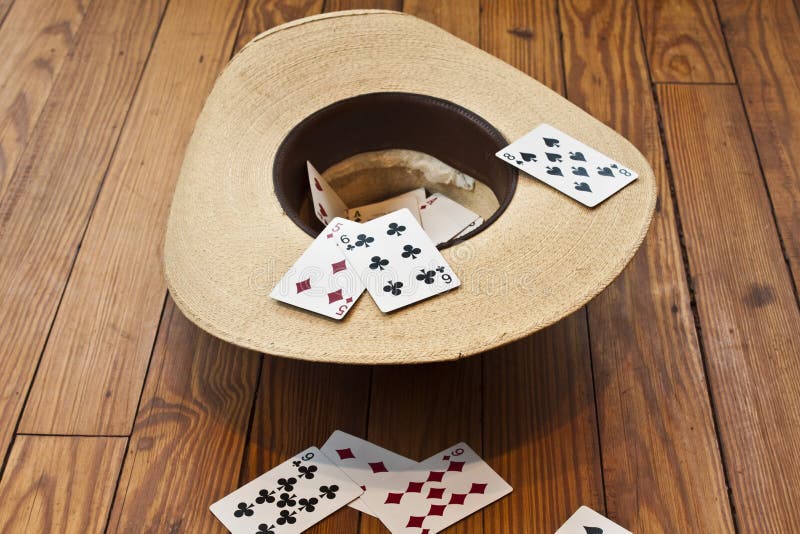 Cowboy hat with cards stock photo. Image of brim, spades - 15090454
