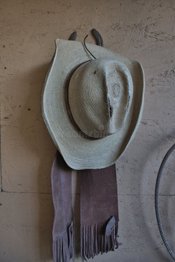 Cowboy hat and chaps stock photo. Image of rope, room - 245590394