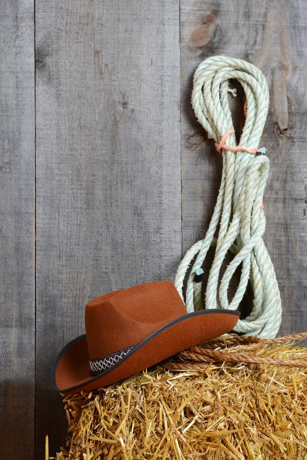 American West Rodeo Cowboy Hat in Old Western Barn Stock Image - Image ...