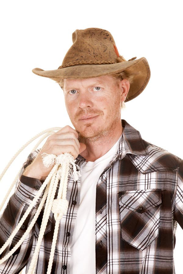 Cowboy Holding Rope Over Shoulder Looking Close Stock Image - Image of ...