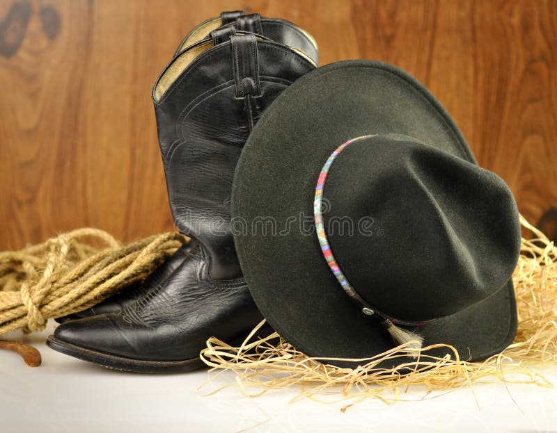 American West Rodeo Cowboy Hat on Boots and Lariat Stock Image - Image ...