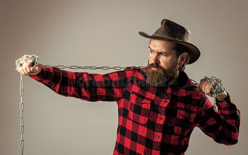 Cowboy Man with Beard and Mustache Pull Steel Chain, Routine at Ranch ...