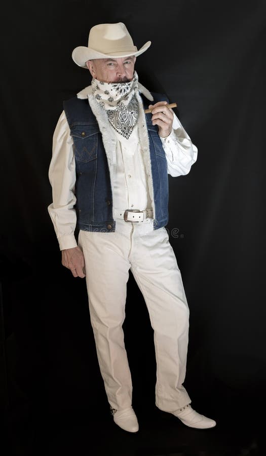 The Cowboy with Mustache in a White Hat, Smoking a Cigar Stock Image ...
