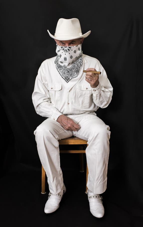 The Cowboy with Mustache in a White Hat, Smoking a Cigar Stock Photo ...