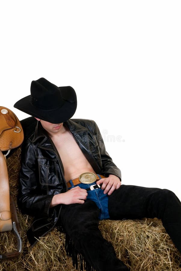 Cowboy op hooi stock afbeelding. Image of uitrusting - 11844399