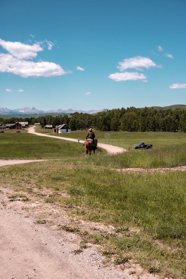 Cowboy Riding through Rural Landscape Stock Image - Image of freedom ...