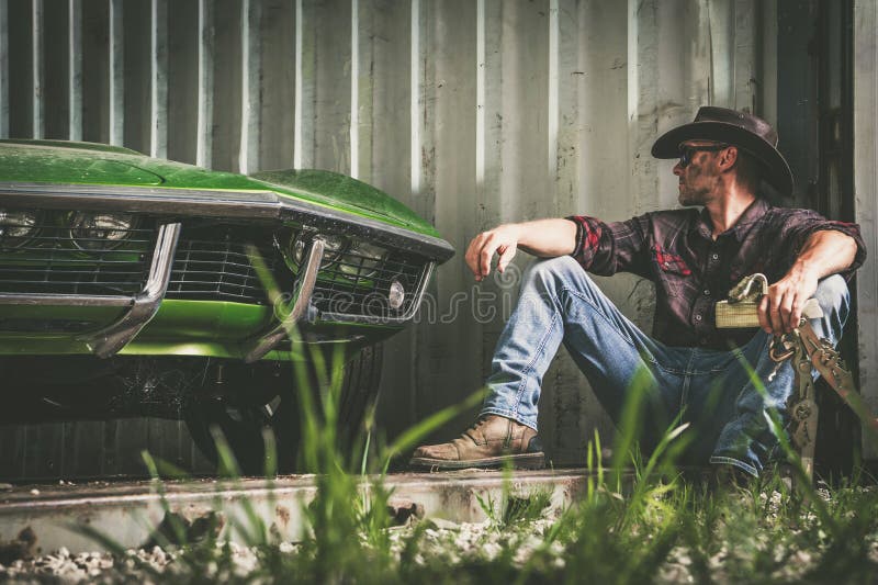 Cowboy Seating Next To His American Classic Car Stock Photo - Image of ...