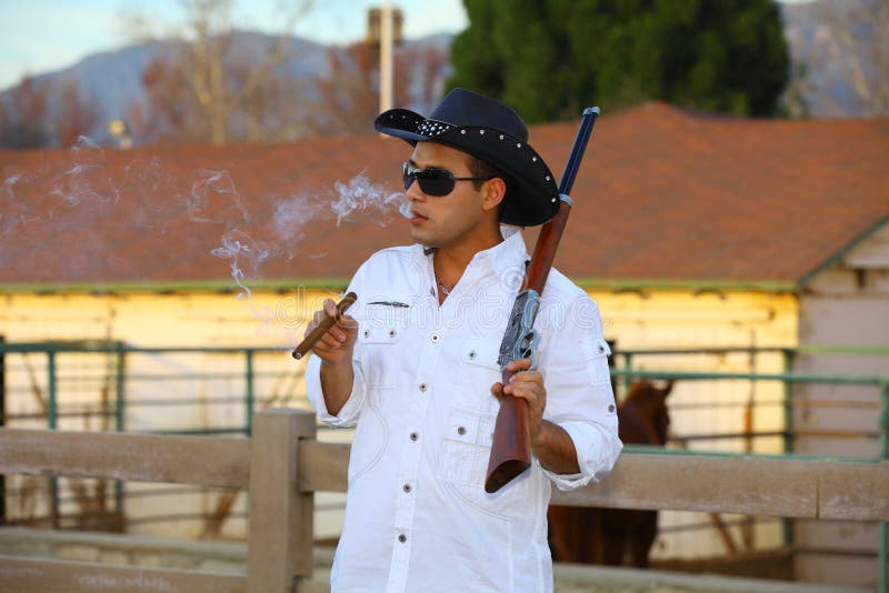 Cowboy Smoking a Cigar and Relaxing Stock Image - Image of serious ...