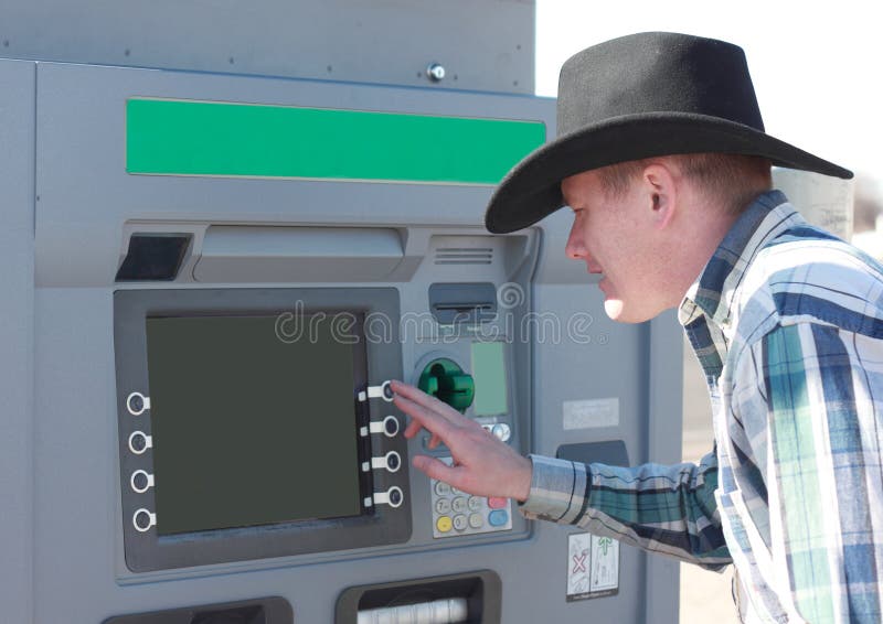 Cowboy Using ATM Machine stock image. Image of male, machine - 23513555