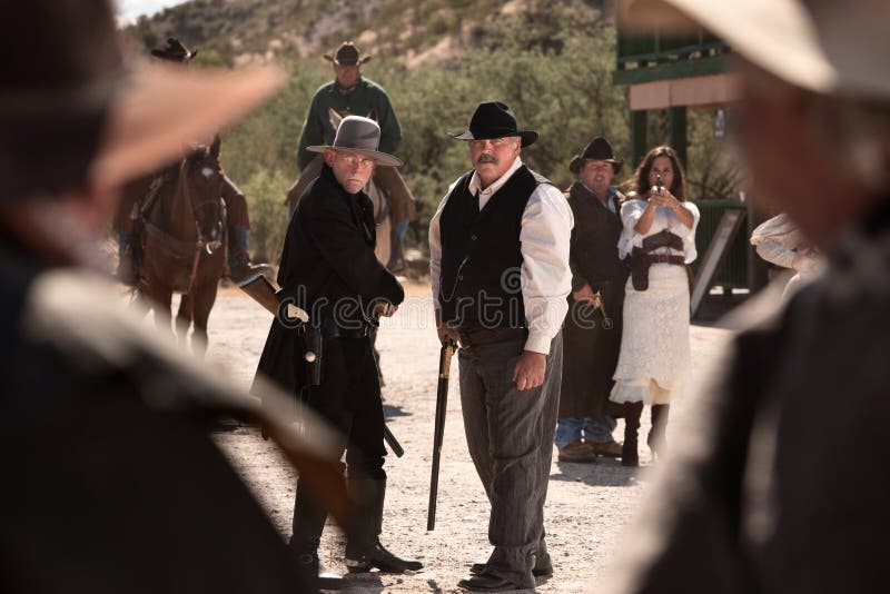 Cowboys Battle in Street stock image. Image of revolver - 24882429
