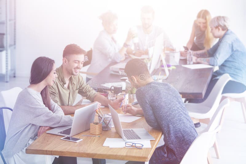 Coworkers being creative stock image. Image of glasses - 96330259