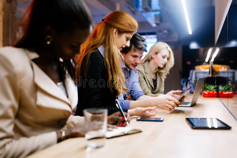 Coworkers bonding in pub stock photo. Image of businessman - 119862246