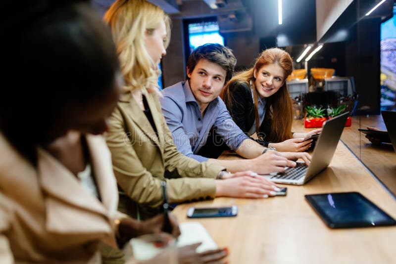 Coworkers bonding in pub stock photo. Image of lifestyles - 67155196