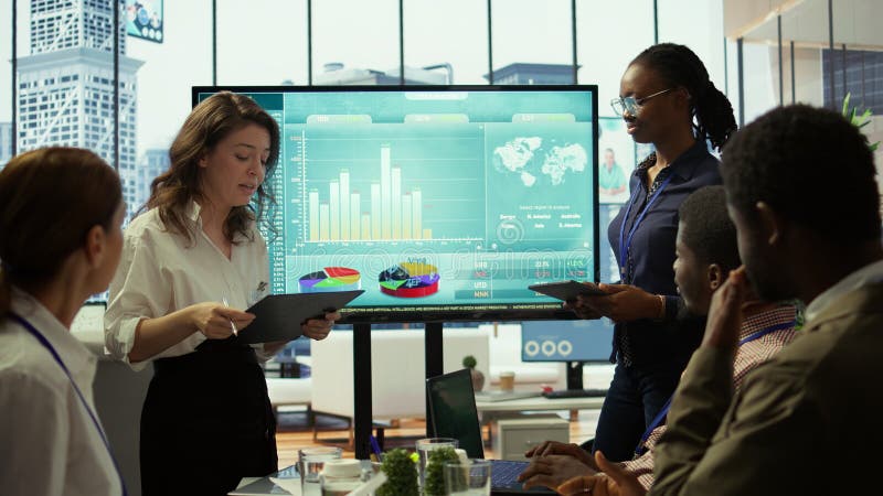 Coworkers Engaging in a Problem Solving Meeting at a Corporation Stock ...