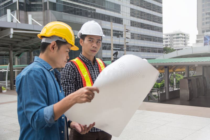 Coworkers of Engineer Discussing the Moving Forward Plan Stock Photo ...