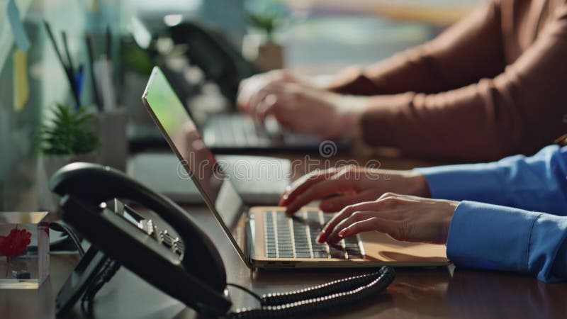 Coworkers Hands Typing Laptop in Office Workspace Closeup. Managers ...