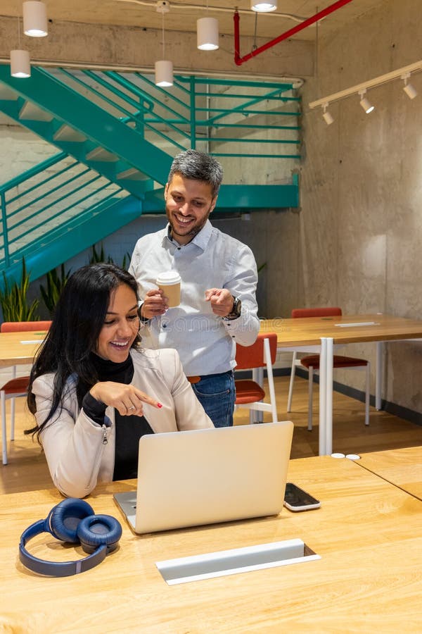 Coworkers Having a Work Conversation while Having Coffee Stock Photo ...