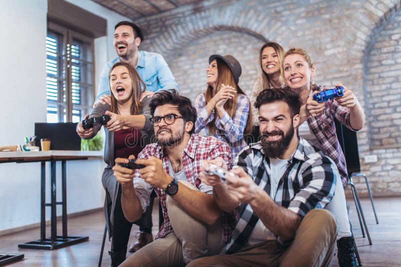 Coworkers Playing Video Games Stock Photo - Image of activity, group ...