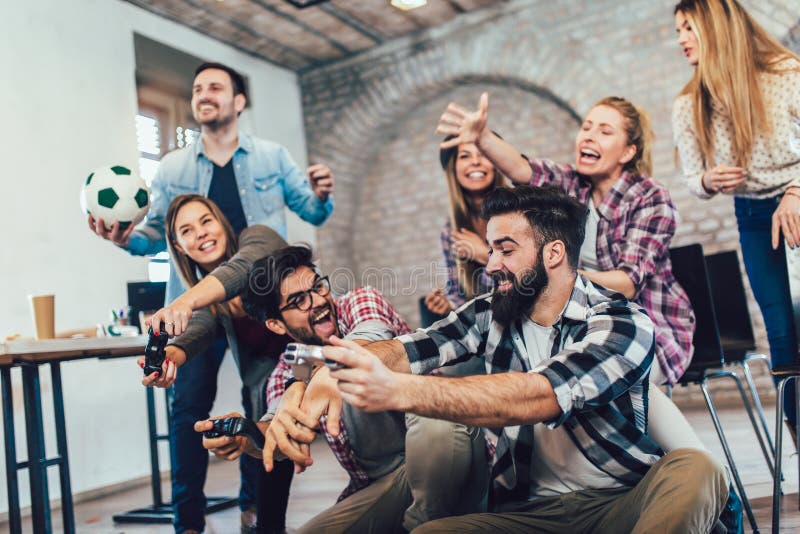 Coworkers Playing Video Games Stock Photo - Image of modern, coworkers ...