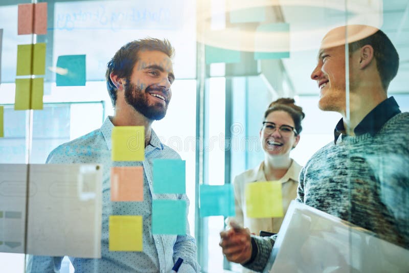 Coworkers, Presentation and Sticky Notes in Office for Proposal ...