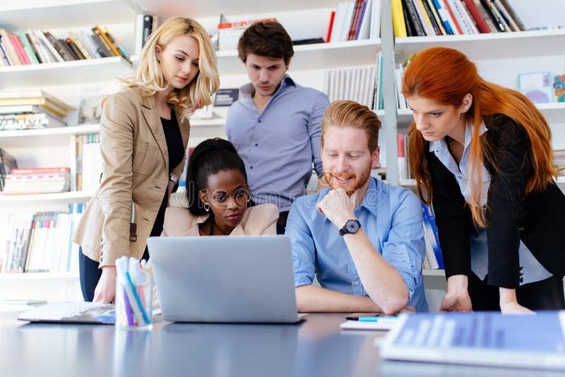 Two Colleagues Solving Problem On Laptop Stock Photo - Image of adult ...
