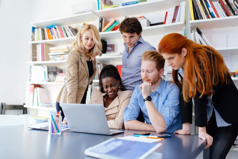 Two Colleagues Solving Problem On Laptop Stock Photo - Image of adult ...