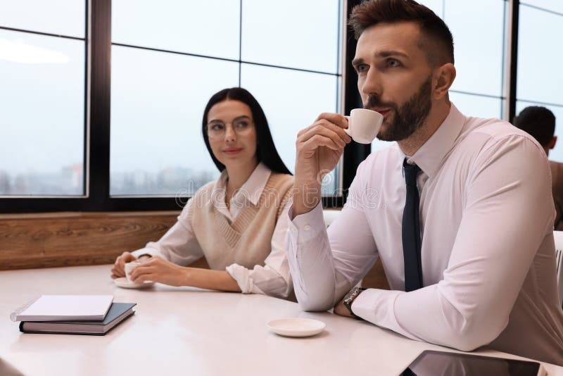 Coworkers Talking in Cafe during Coffee Break Stock Image - Image of ...