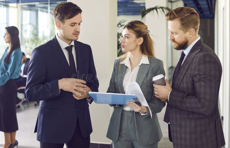 Coworkers Talking and Discussing during Office Meeting Stock Image ...