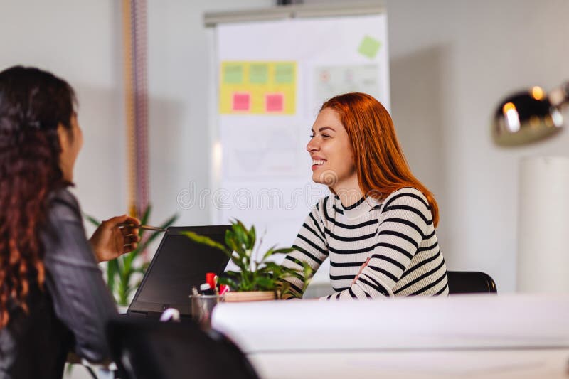 Coworkers Talking about Serious Topics in Their Office on the Job Stock ...