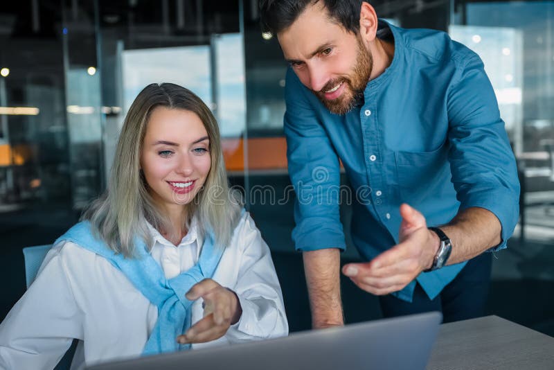 Coworkers Working on a Project and Looking Interested Stock Image ...