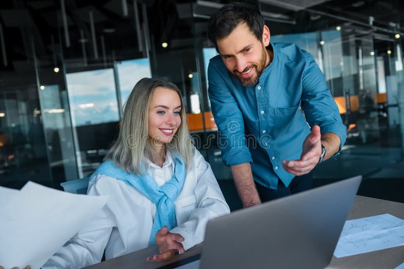 Coworkers Working on a Project and Looking Interested Stock Photo ...