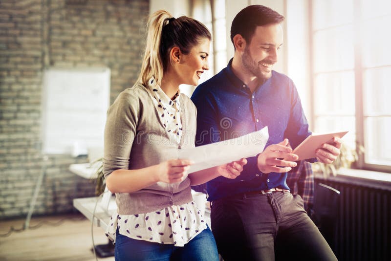 Coworking Colleagues Having Conversation at Workplace Stock Photo ...