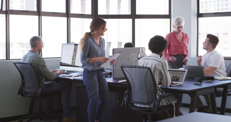 Employee Asking for Help from Coworker after Being Stuck on Project ...