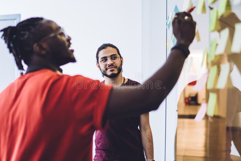 Coworking Young People Writing on Sticky Notes Stock Photo - Image of ...