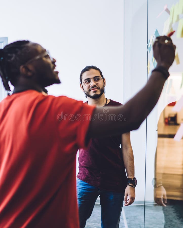 Coworking Young People Writing on Sticky Notes Stock Photo - Image of ...