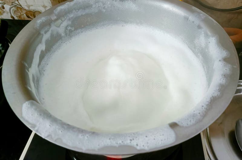 Cows Milk Boiled and Overflowing. Boiling Milk Stock Photo - Image of ...