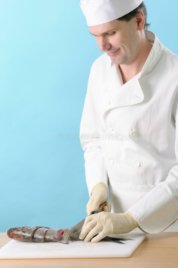 Cozinheiro Chefe Que Cozinha Um Peixe Imagem de Stock - Imagem de chefe ...